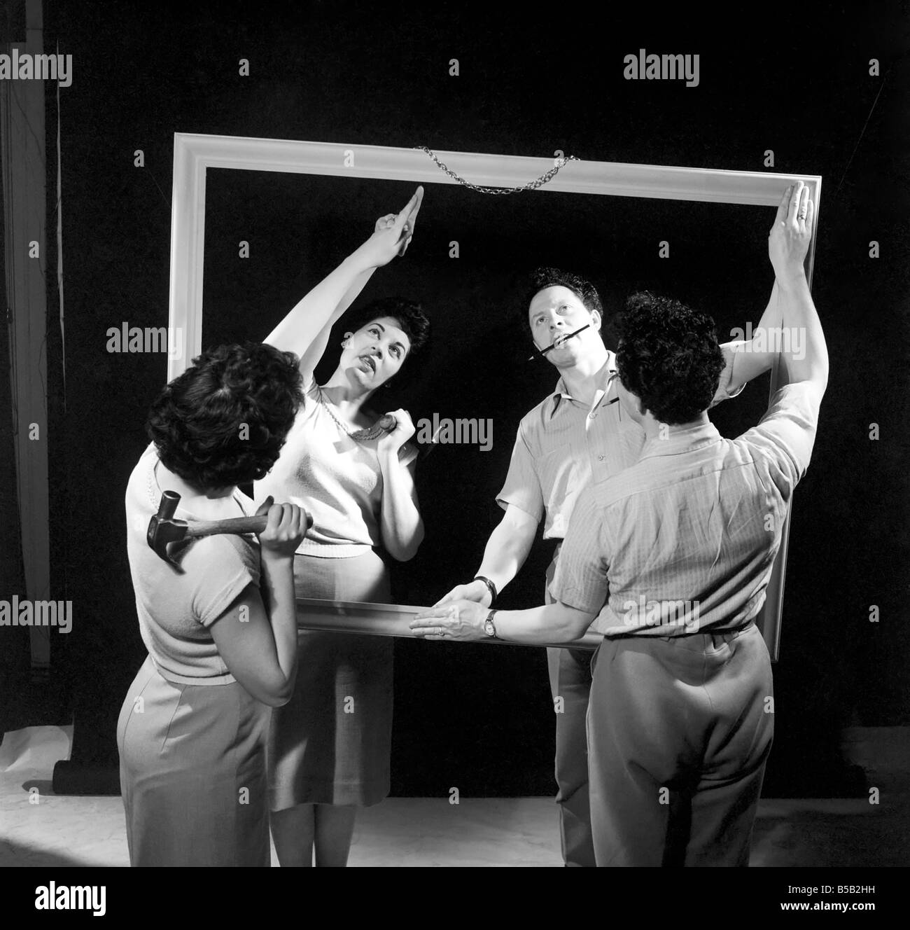 Mirror image: A couple argue in front of a mirror. 1958 Stock Photo - Alamy
