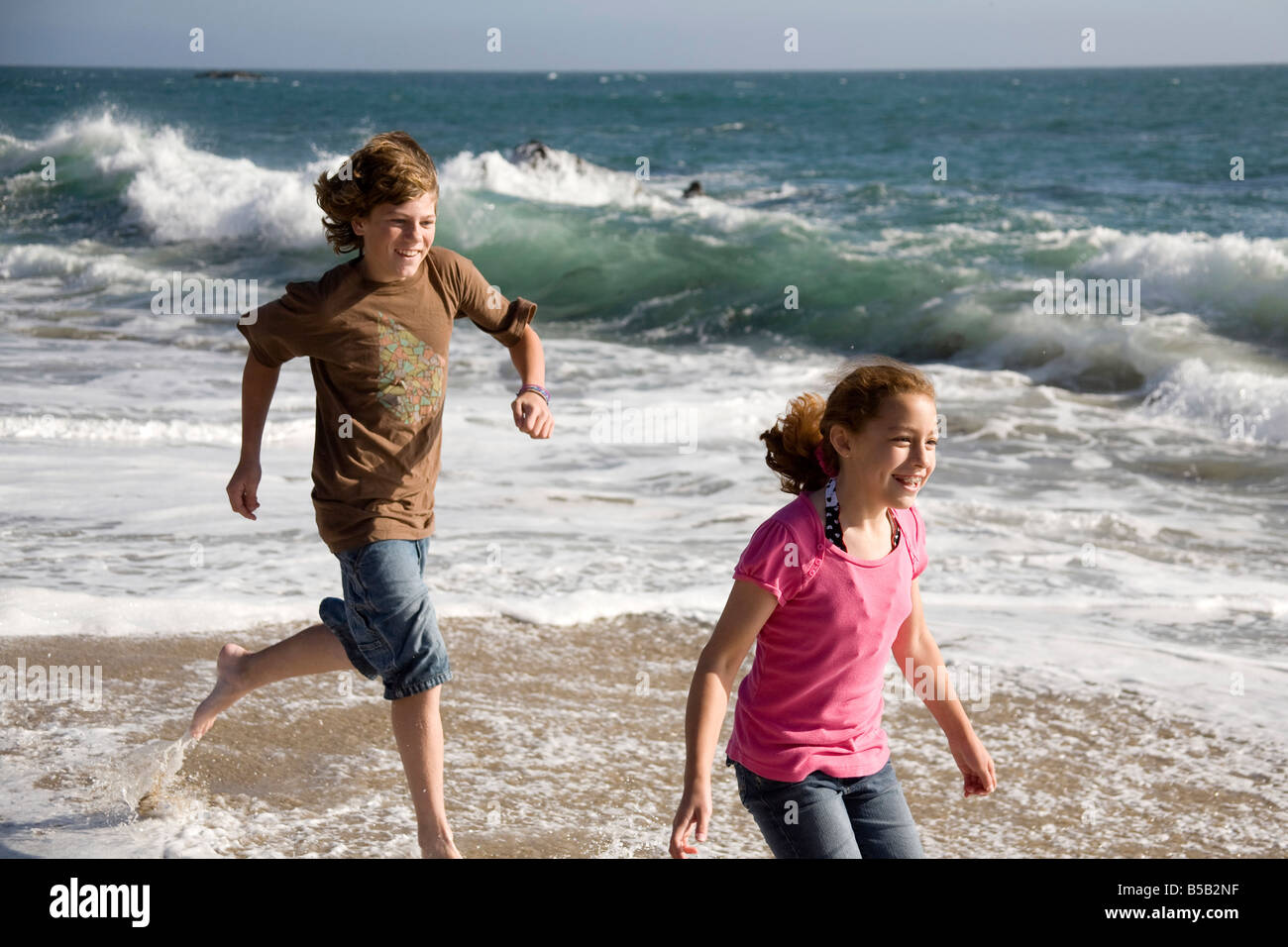 Boy chases girl hi-res stock photography and images - Alamy