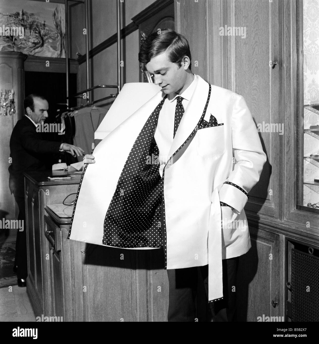 Men modelling the latest 1963 menswear design's in a Paris boutique ...