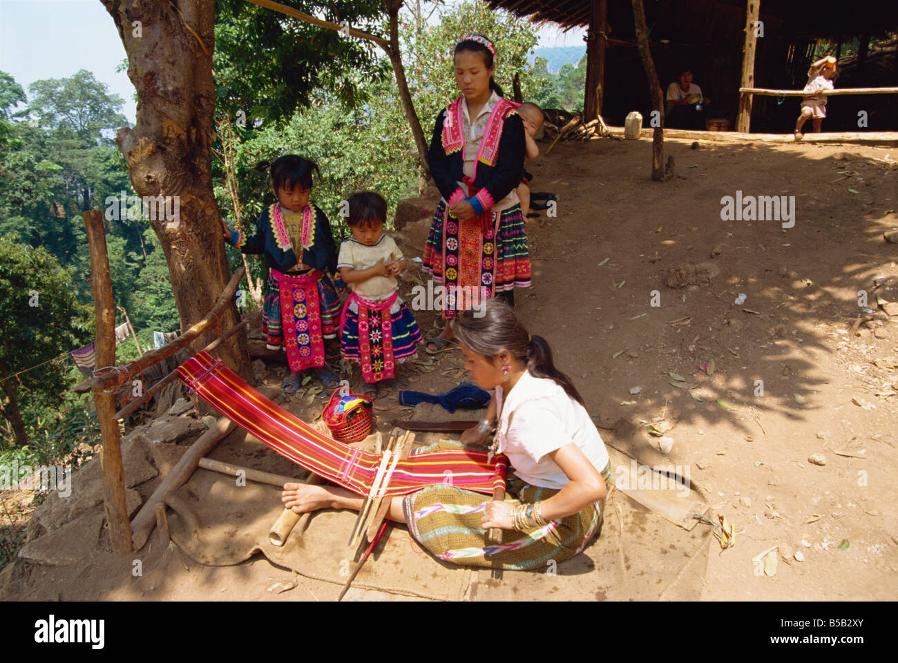 Meo hill tribe woman weaving near Chiang Mai Thailand Southeast Asia ...