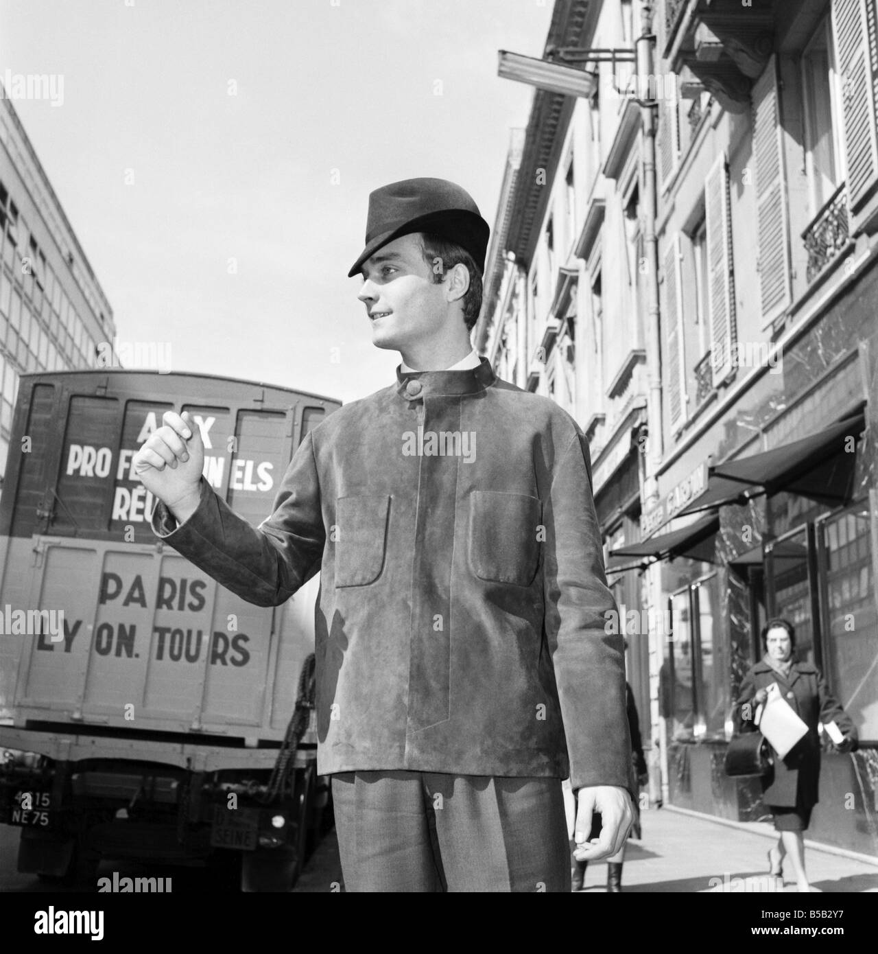 Men modelling the latest 1963 menswear design's in the streets of Paris ...