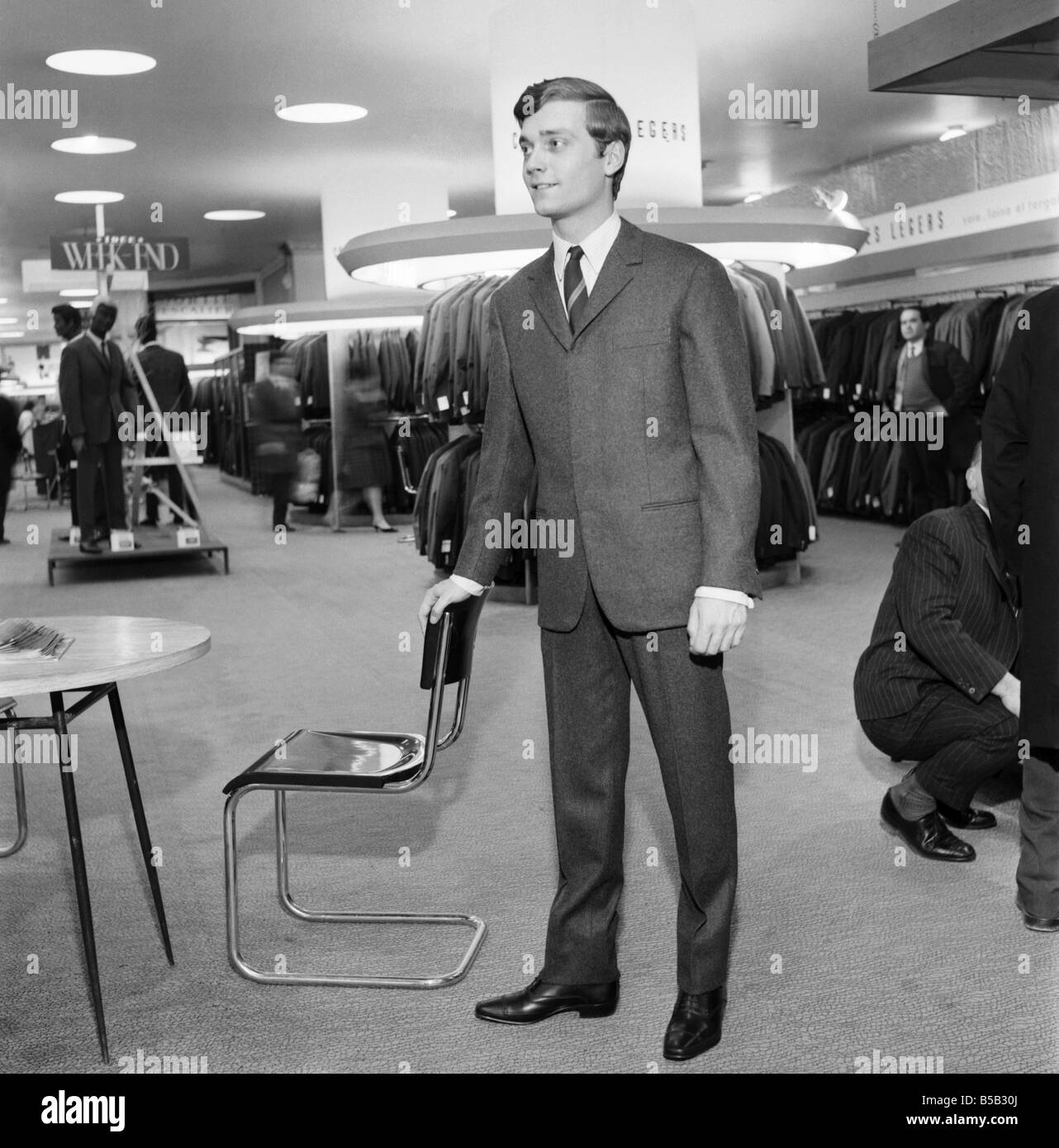 Men modelling the latest 1963 menswear design's in a Paris boutique ...