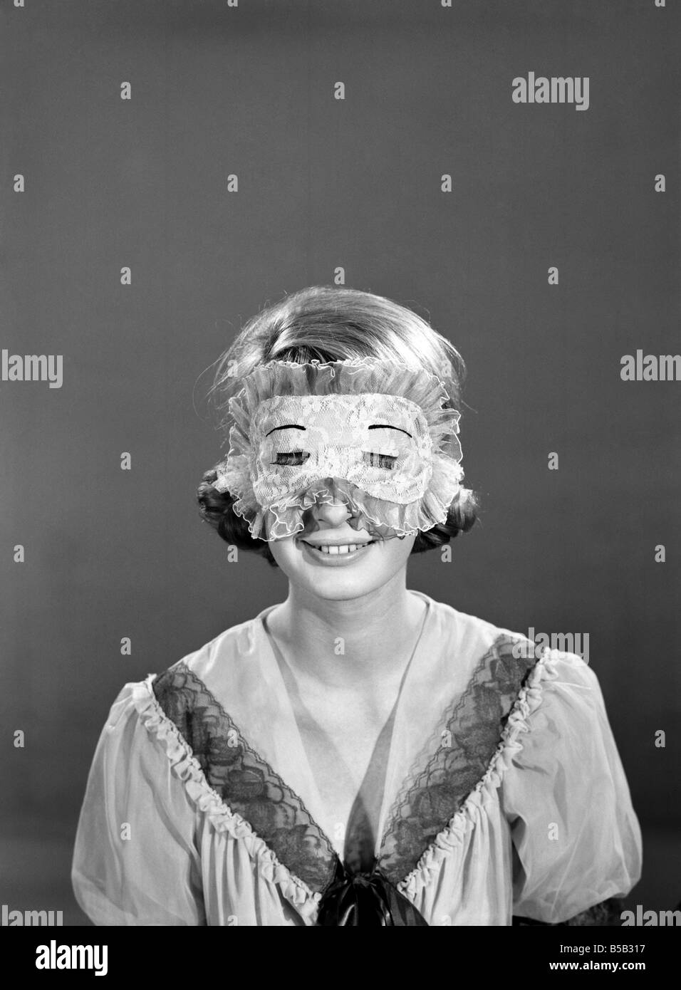 Wearing face mask 1960s hi-res stock photography and images - Alamy