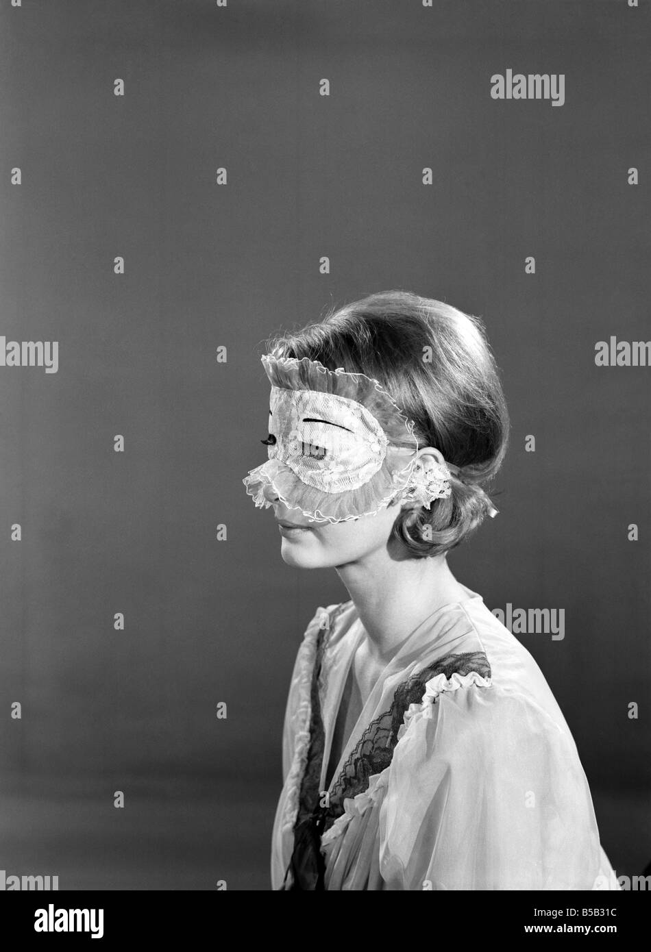 Wearing face mask 1960s hi-res stock photography and images - Alamy
