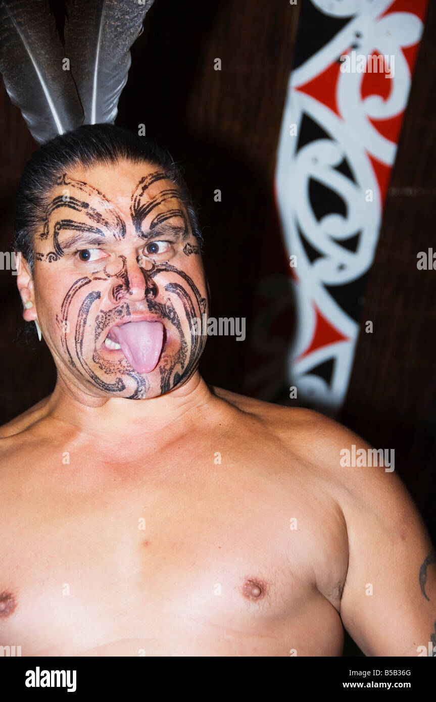 Local Maori man with traditional Moko face tattoo painting, The Tamaki ...