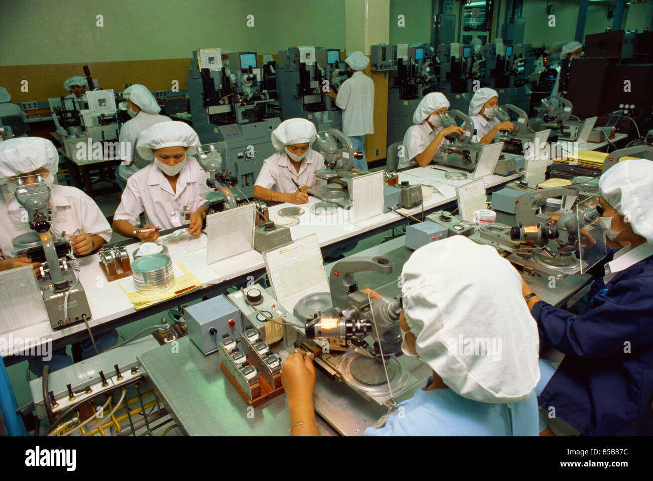 Women working on a production line in the computer industry in Bangkok ...