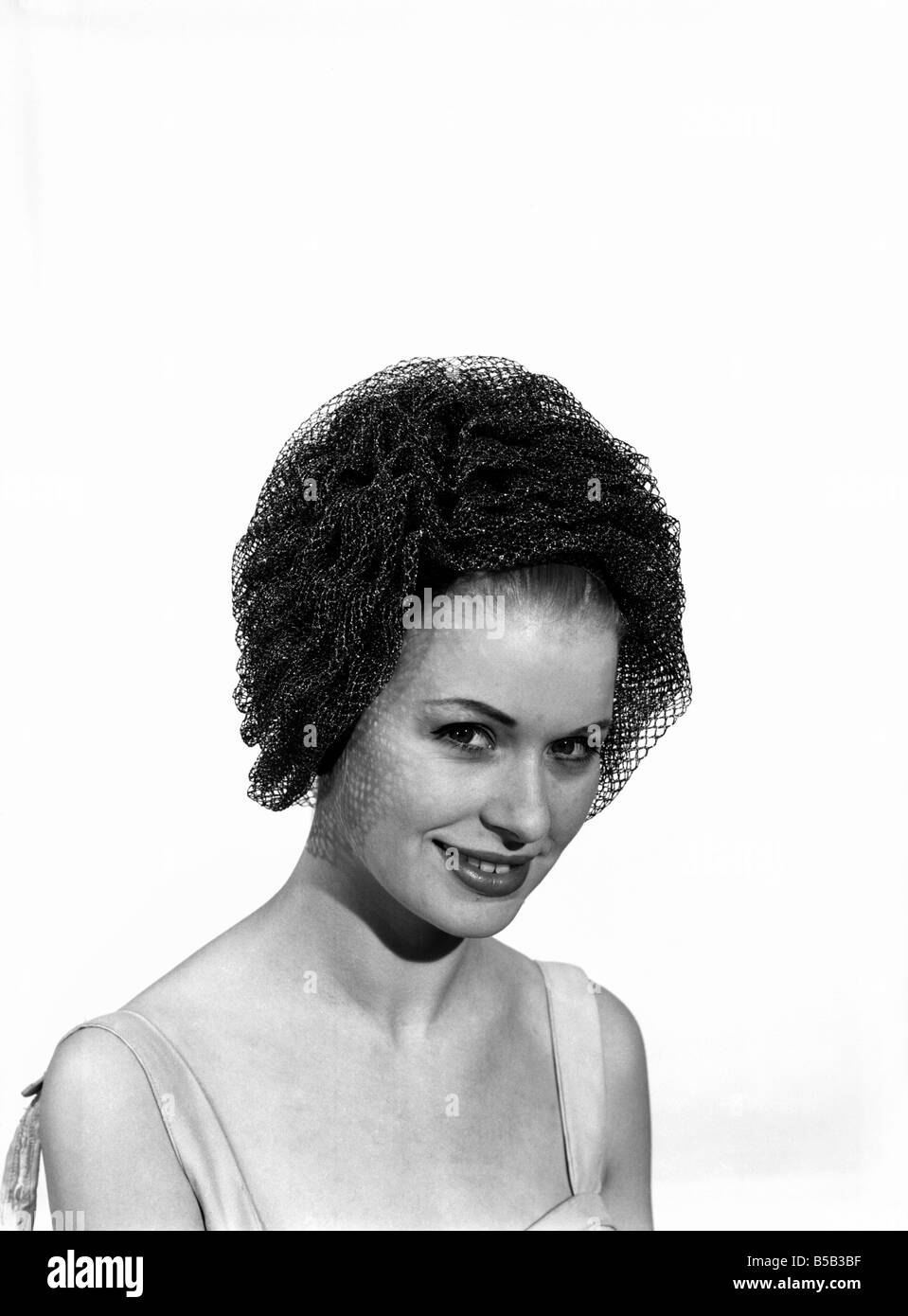 Model Vyvyan Dunbar wearing bathing hats.. Circa 1963 Stock Photo - Alamy