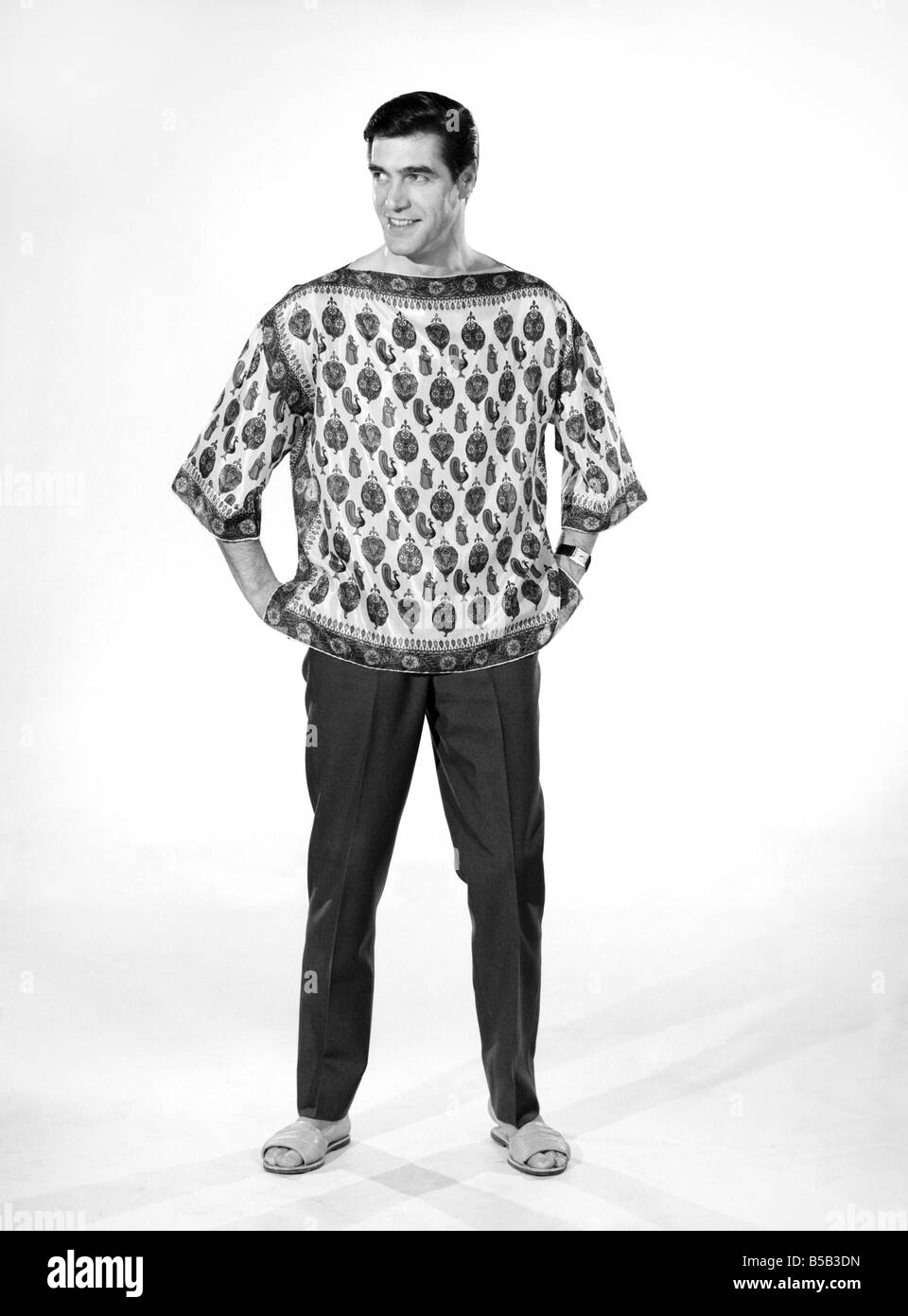 Male model Peter Christian wearing silk shirt. Circa 1964 Stock Photo ...