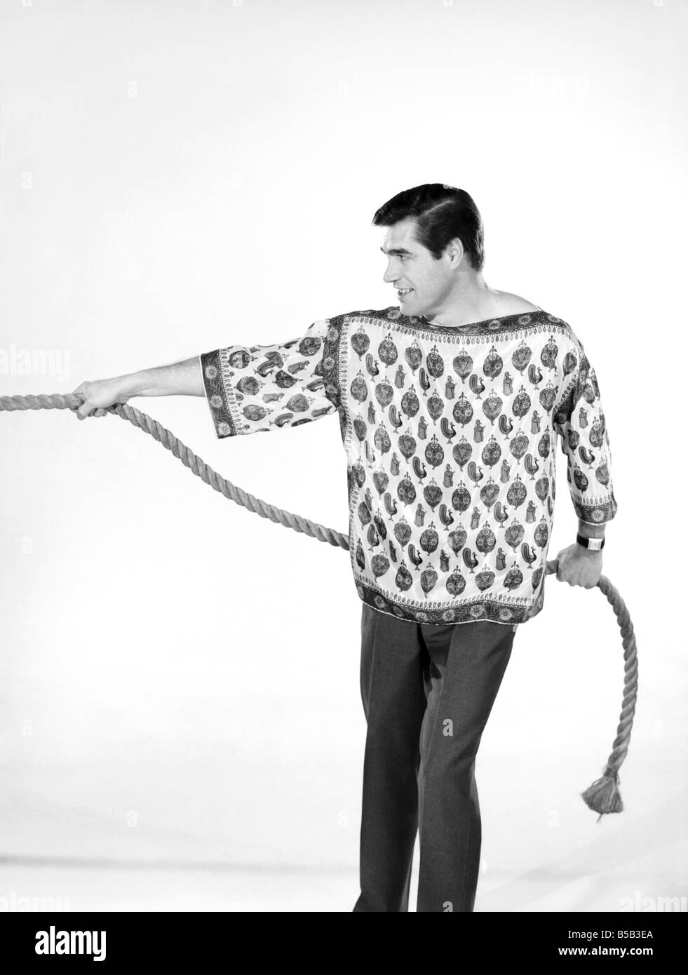 Male model Peter Christian wearing silk shirt. Circa 1964 Stock Photo ...