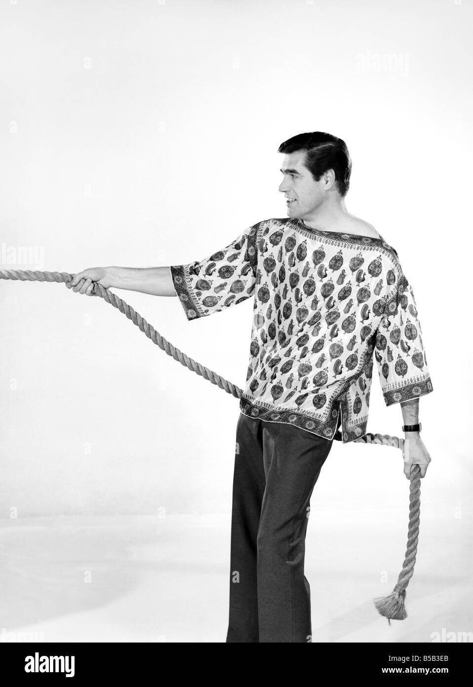 Male model Peter Christian wearing silk shirt. Circa 1964 Stock Photo ...