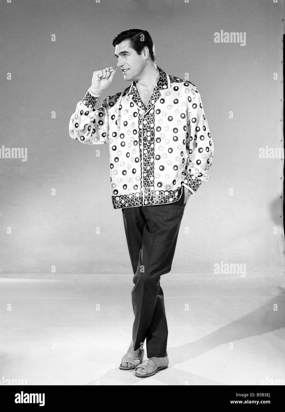 Male model Peter Christian wearing silk shirt. Circa 1964 Stock Photo ...