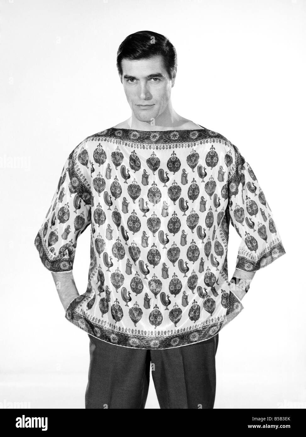 Male model Peter Christian wearing silk shirt. Circa 1964 Stock Photo ...