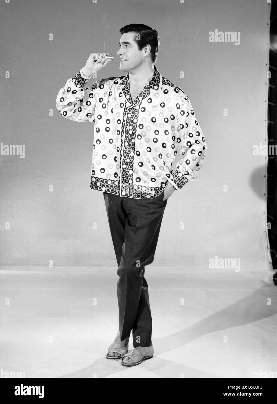 Male model Peter Christian wearing silk shirt. Circa 1964 Stock Photo ...