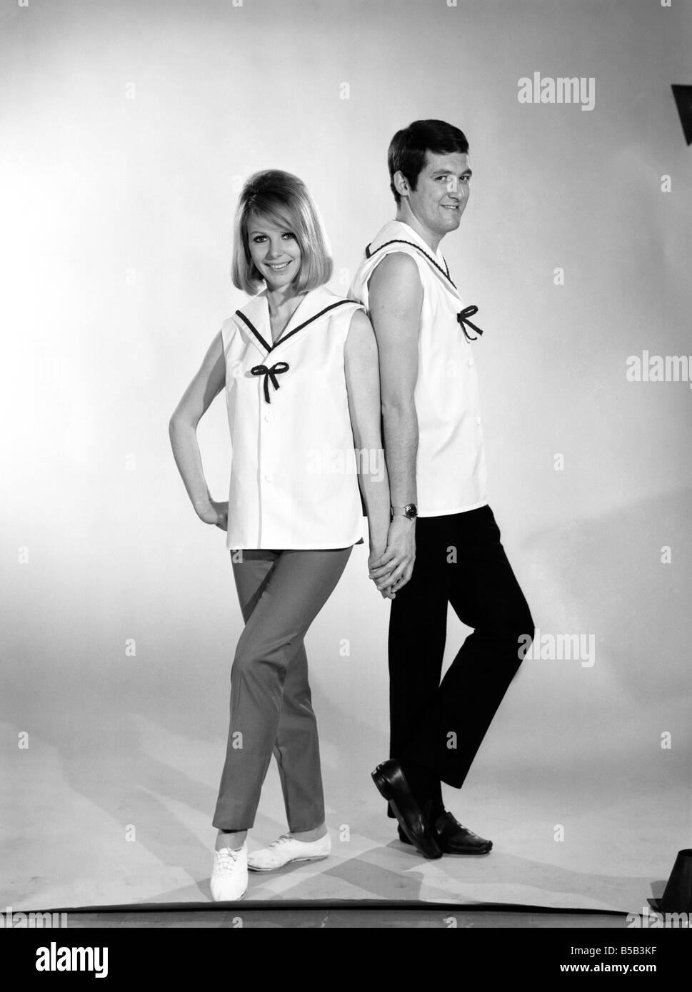 Models Mike Lester and Jill Carter wearing his and her naval fashion ...