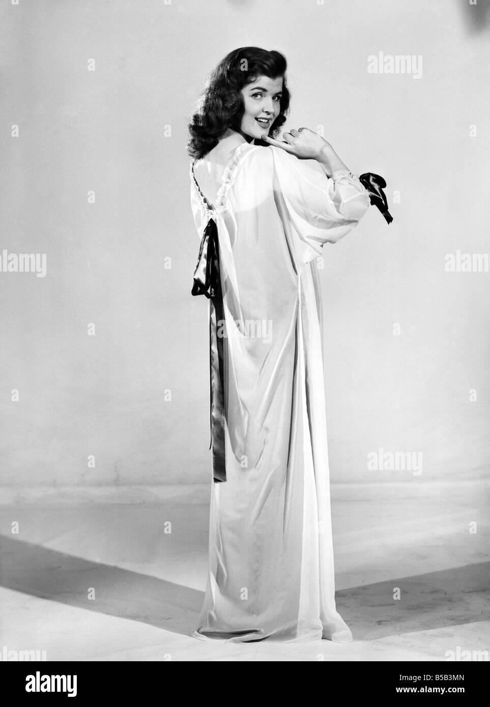 Nightwear: Woman wearing night dress. 1955 Stock Photo - Alamy