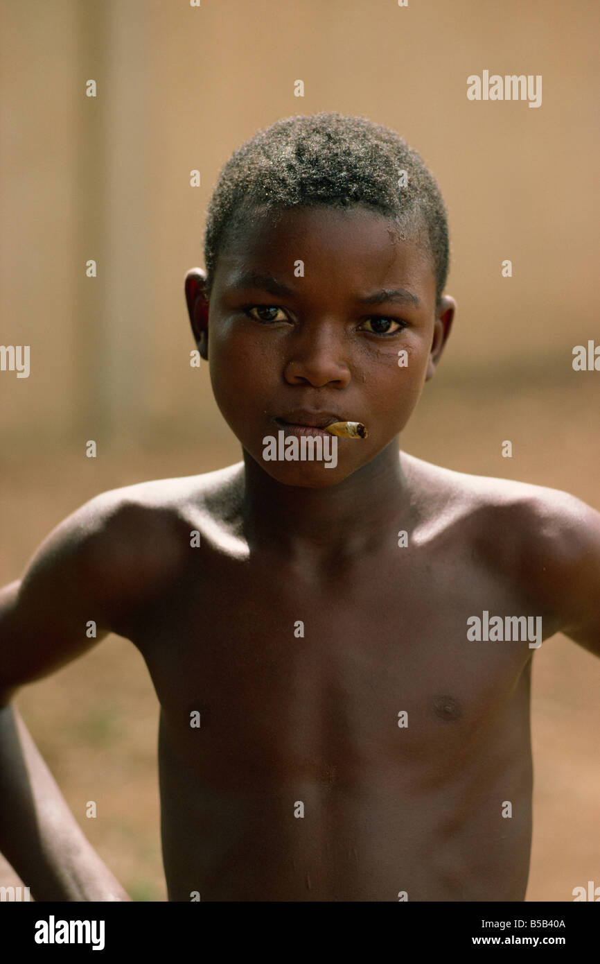 Boy with cigarette Niamey Niger West Africa Africa Stock Photo - Alamy