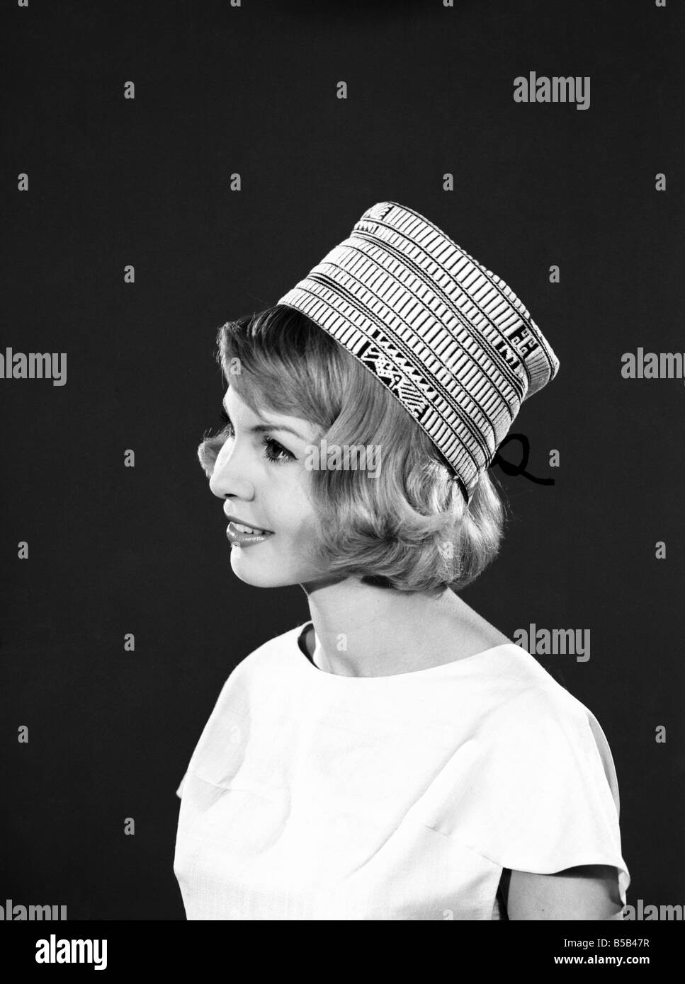 Clothing: Fashion: Hats: Model: Elizabeth Duke. August 1962 B1499-001 ...