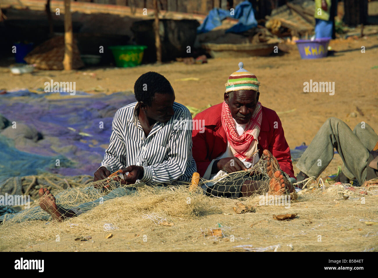 Net menders, fishing village, The Gambia, West Africa, Africa Stock ...