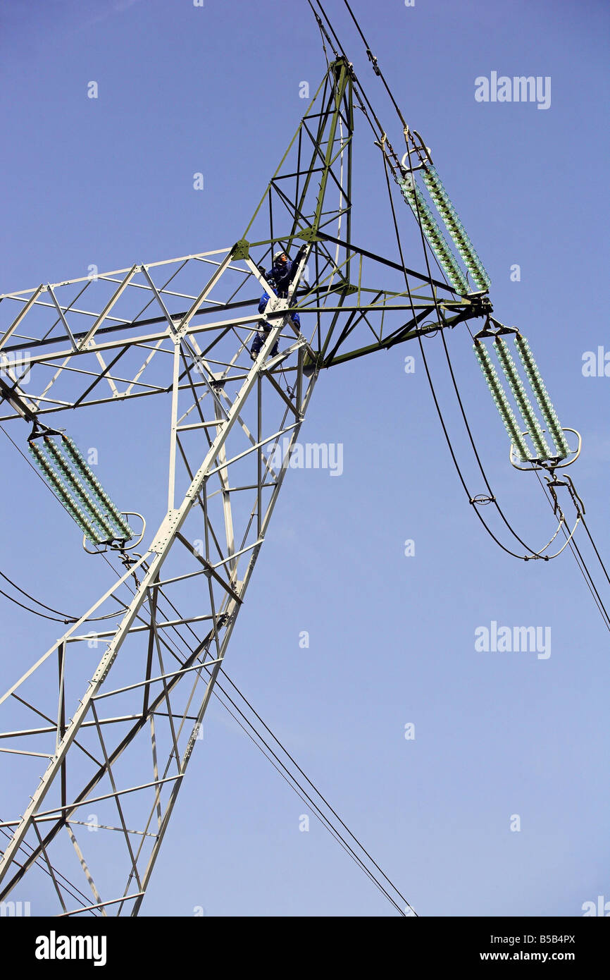 Workers maintaining the transmission line Stock Photo - Alamy