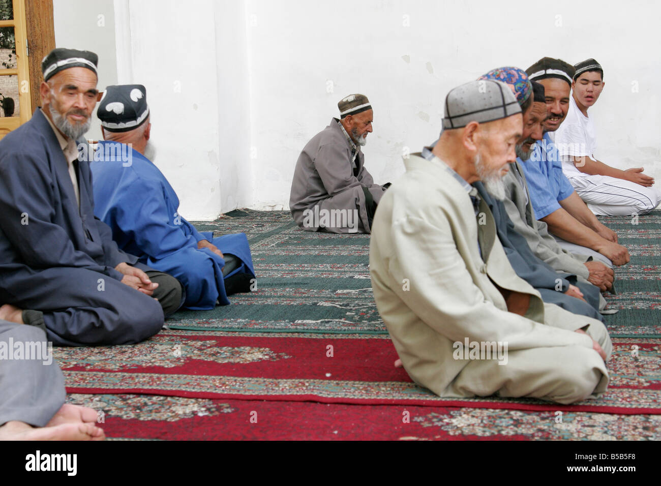 Muslim praying in the mosque, Uzbekistan Stock Photo - Alamy