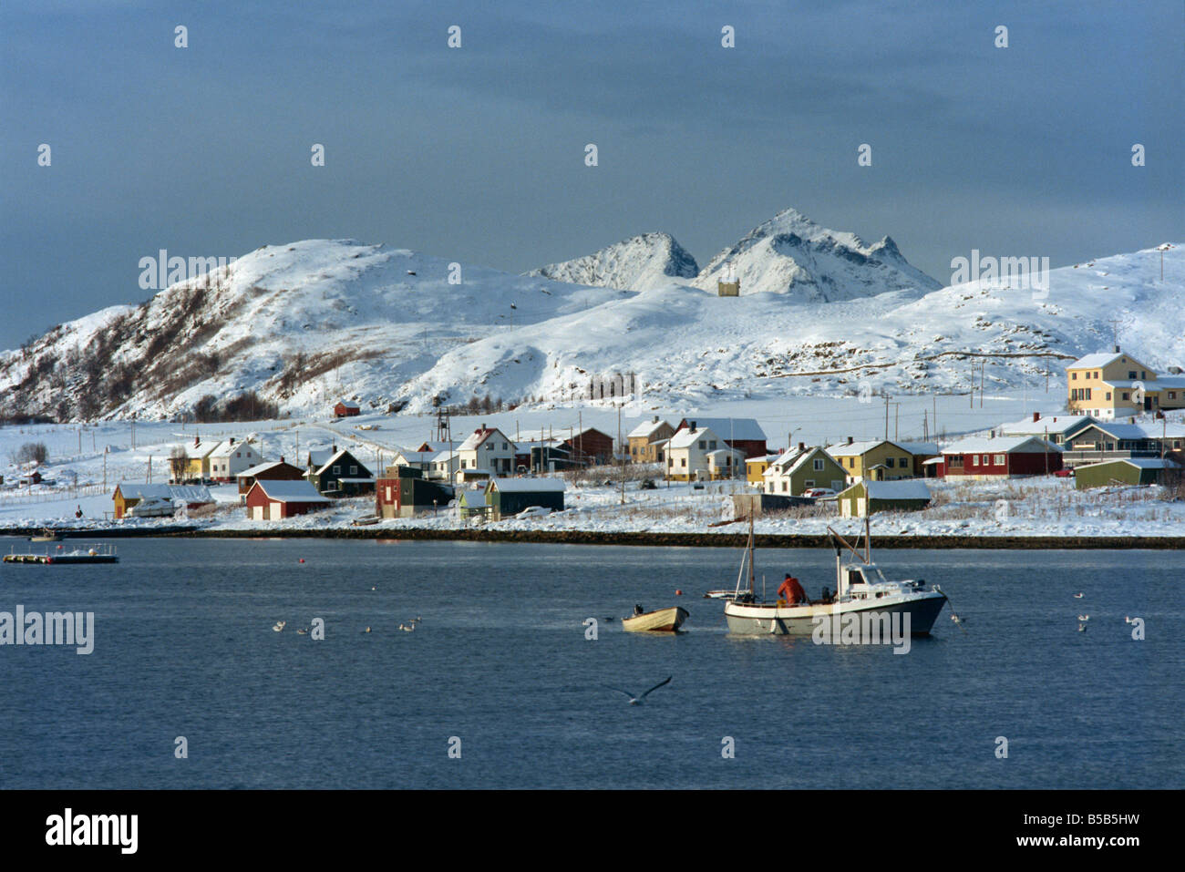 Fishing boat leaving harbour on Kvaloya Island Arctic Norway D Harcourt ...