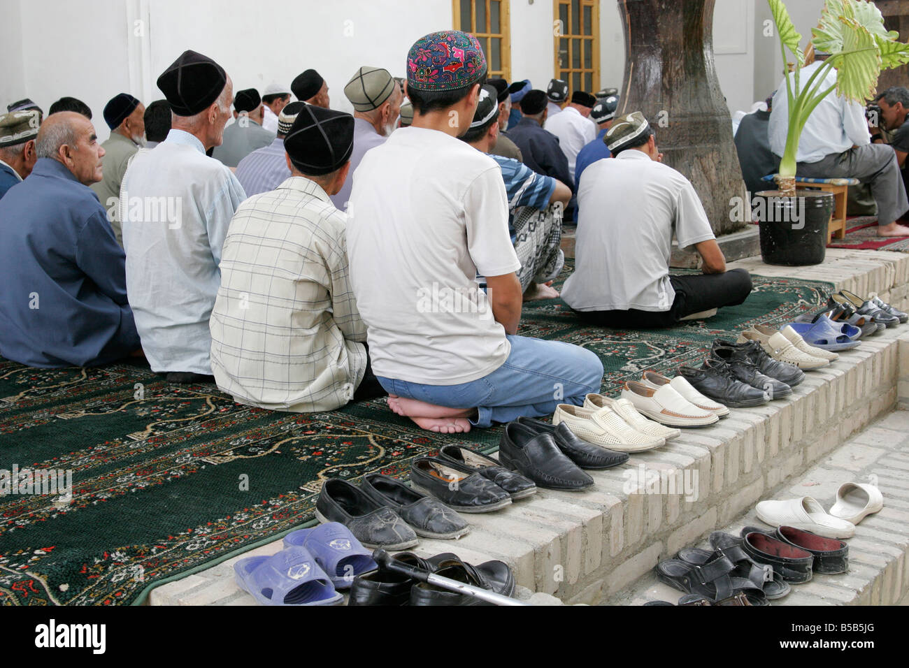 Muslim praying in the mosque, Uzbekistan Stock Photo - Alamy