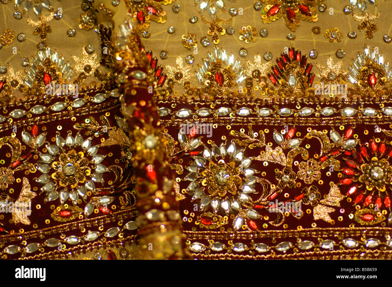 Golden fabric with elaborate embroidery and pearls, handmade, for ...