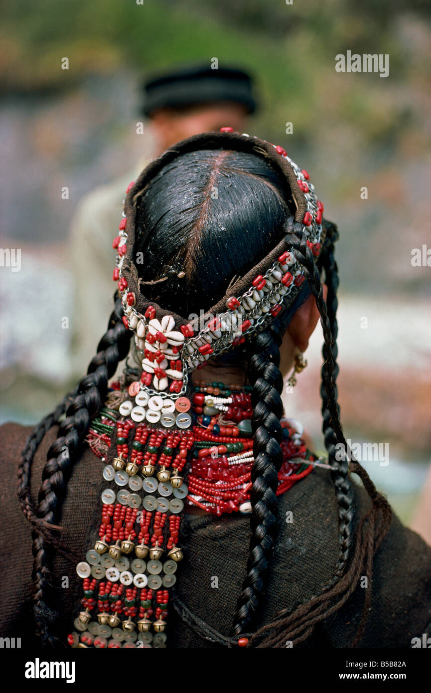 The back view of a womans head-dress and greased hair at Rumboor in ...
