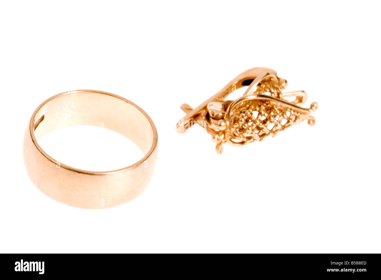 object on white Gold rings Stock Photo - Alamy