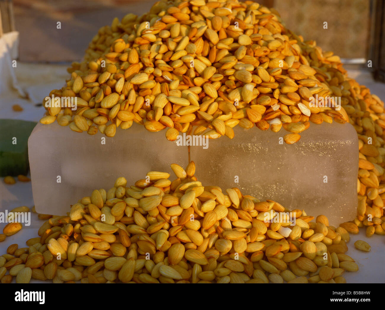 Almonds cooled on blocks of ice, Marmaris, Anatolia, Turkey Minor ...