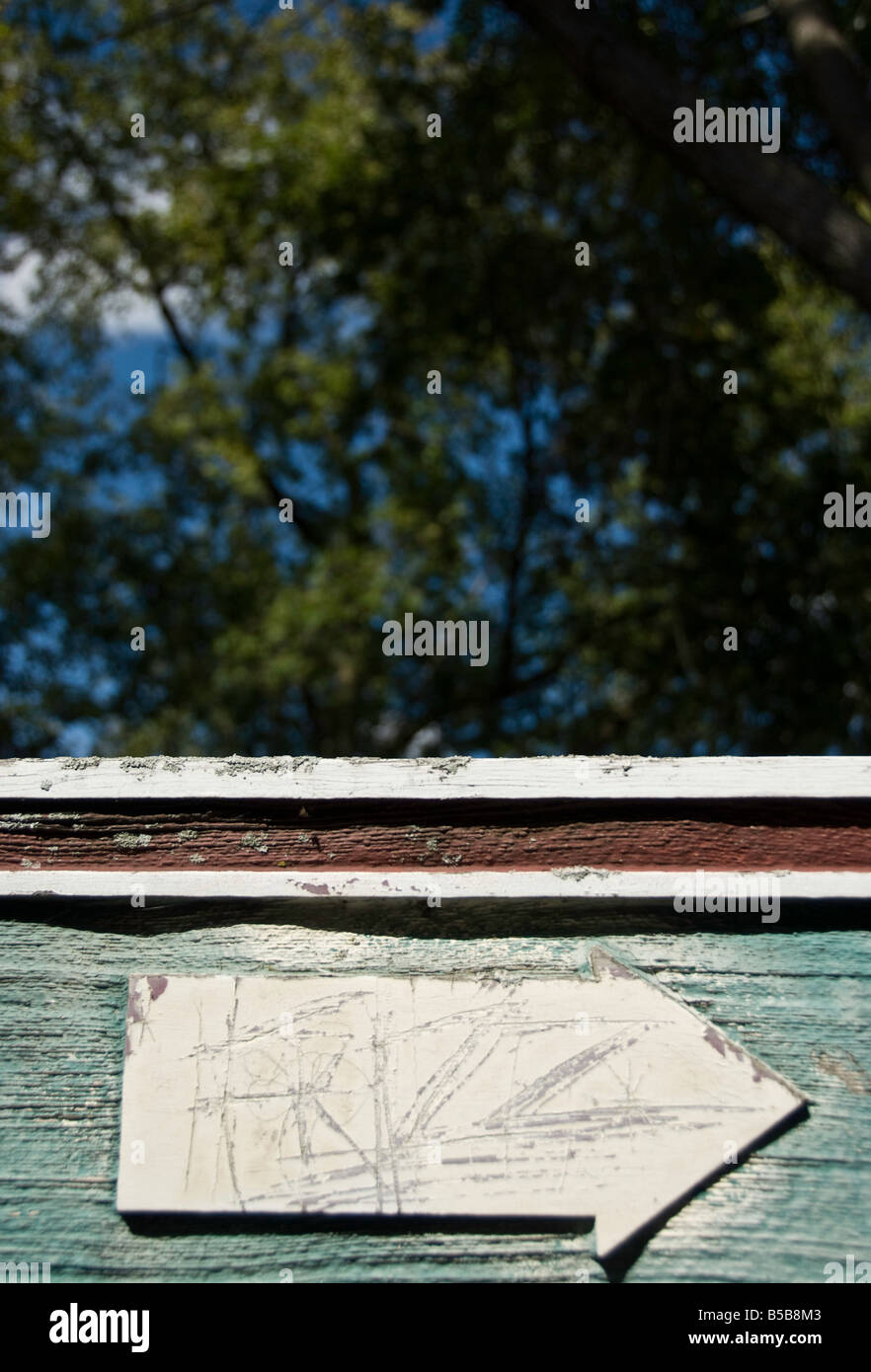 carved wooden arrow on sign Stock Photo - Alamy