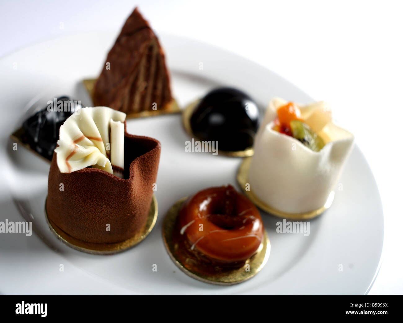 A plate of petits fours shallow depth of field Stock Photo - Alamy