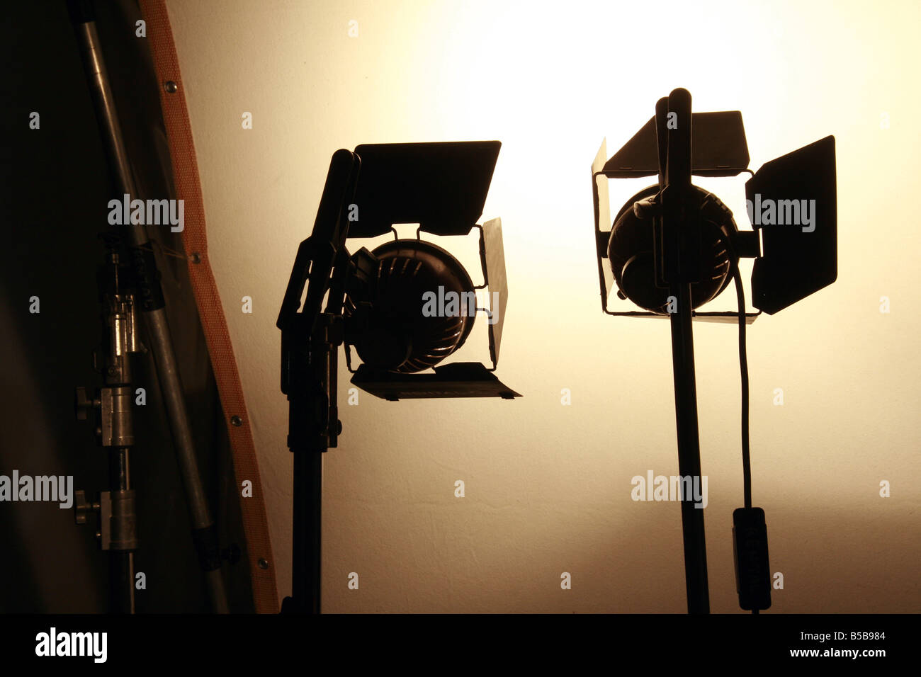 two tv film lights on set outdoors at night Stock Photo - Alamy