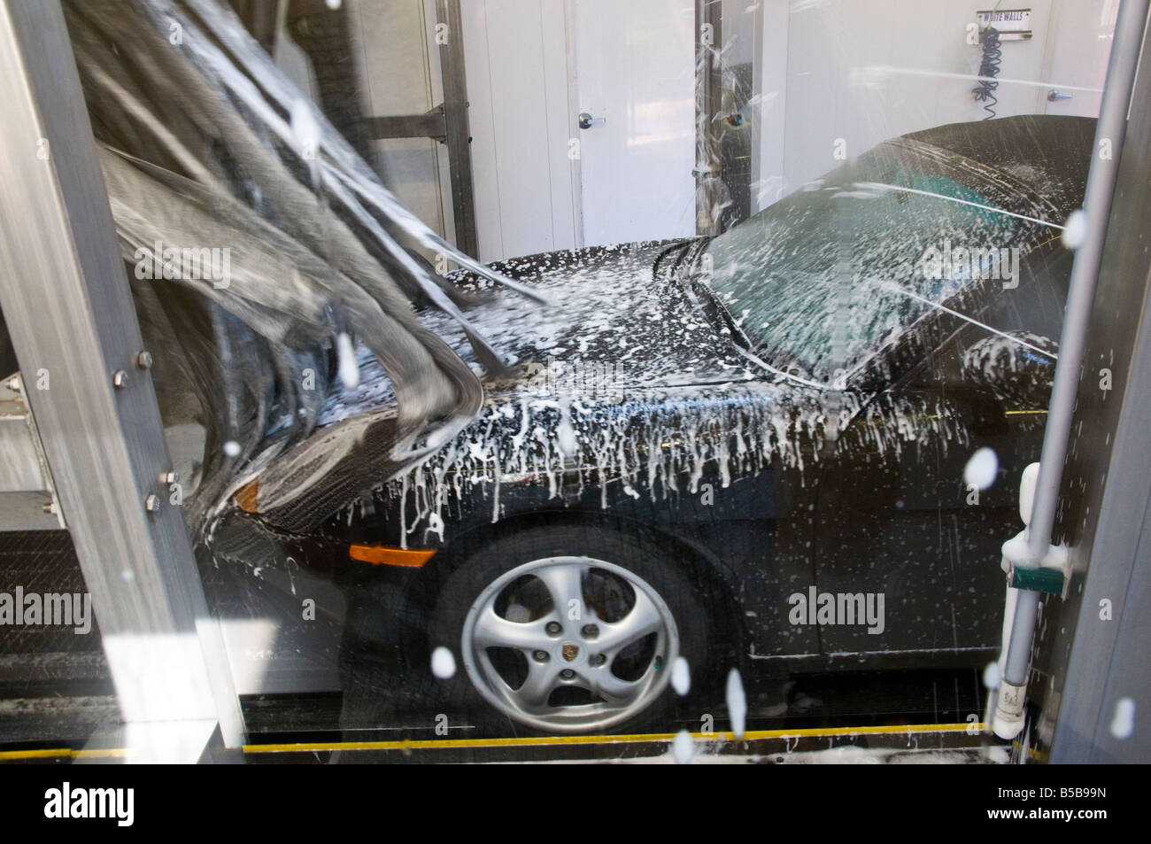 Porsche Boxster in Car Wash Stock Photo - Alamy