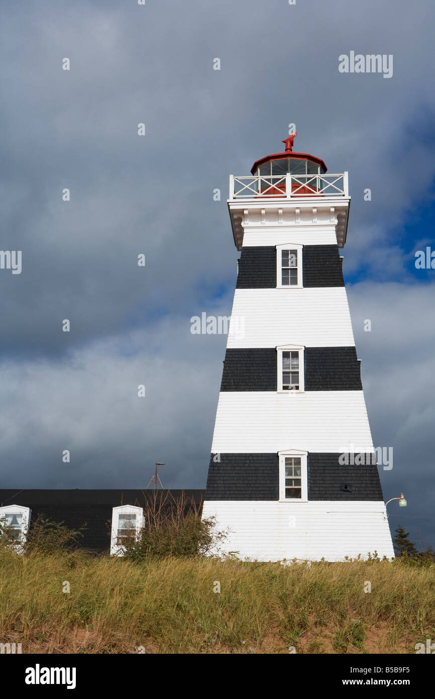 The West Point Lighthouse on the beach on Prince Edward Island, Canada ...