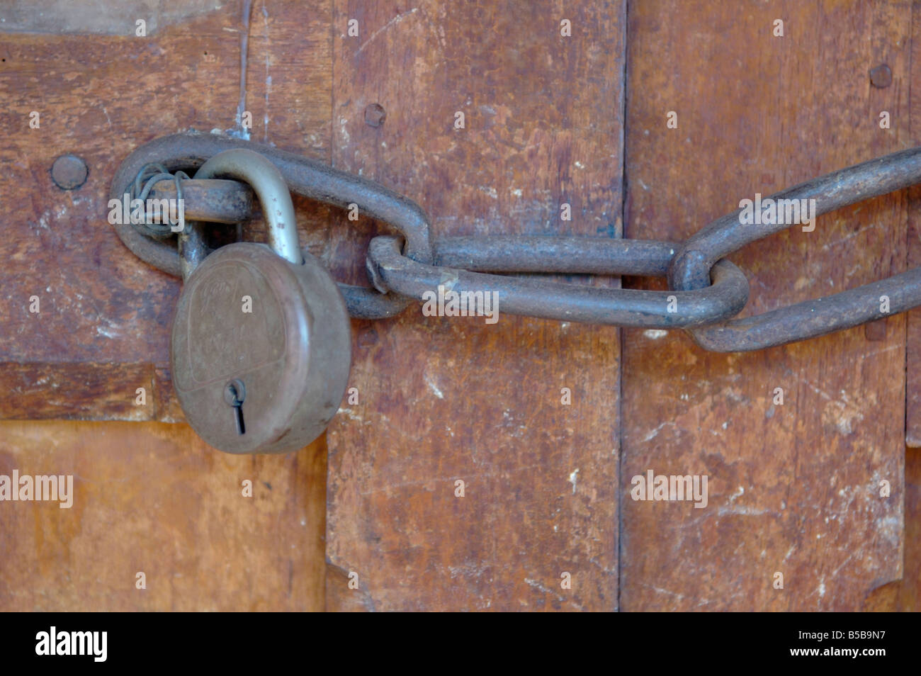 Padlock securing small shop on Bazaar Street. India, Karnataka, Hampi ...
