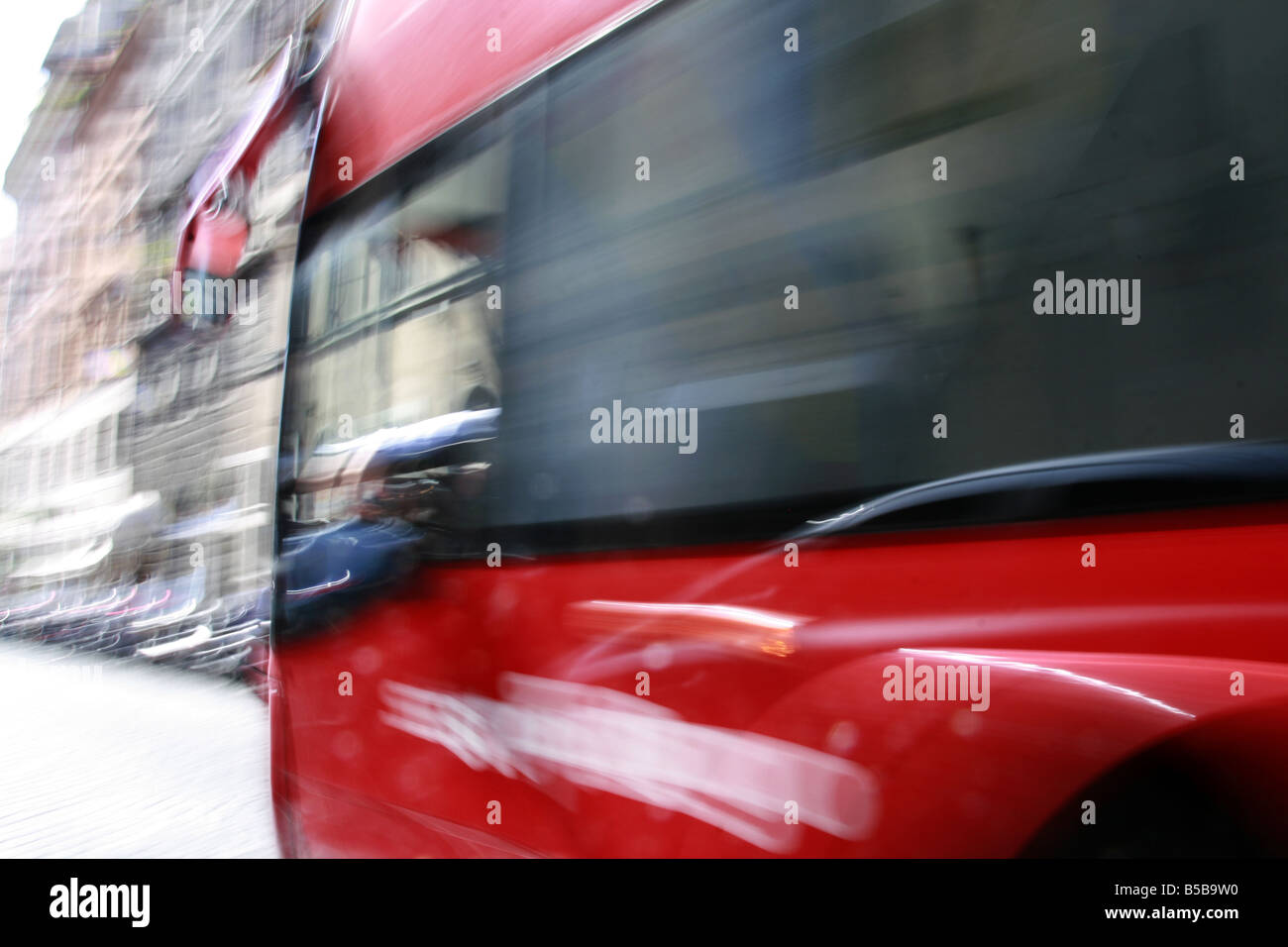 fast bus service on street in city town Stock Photo - Alamy