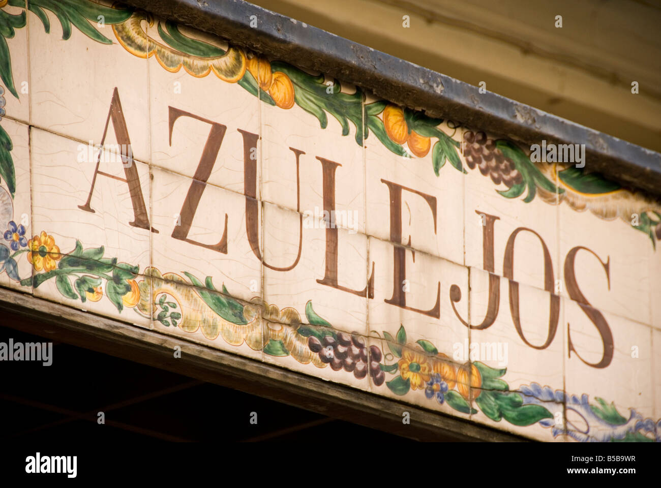 Detail of old shop sign of hand painted tiles or Azulejos in the ...