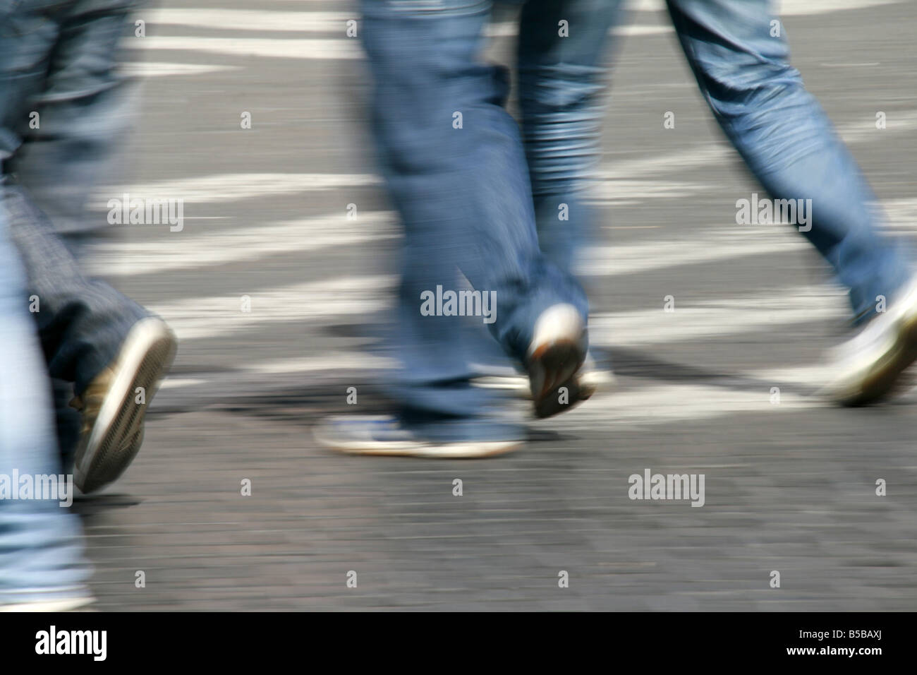 group young people in denim jeans walking in town Stock Photo - Alamy