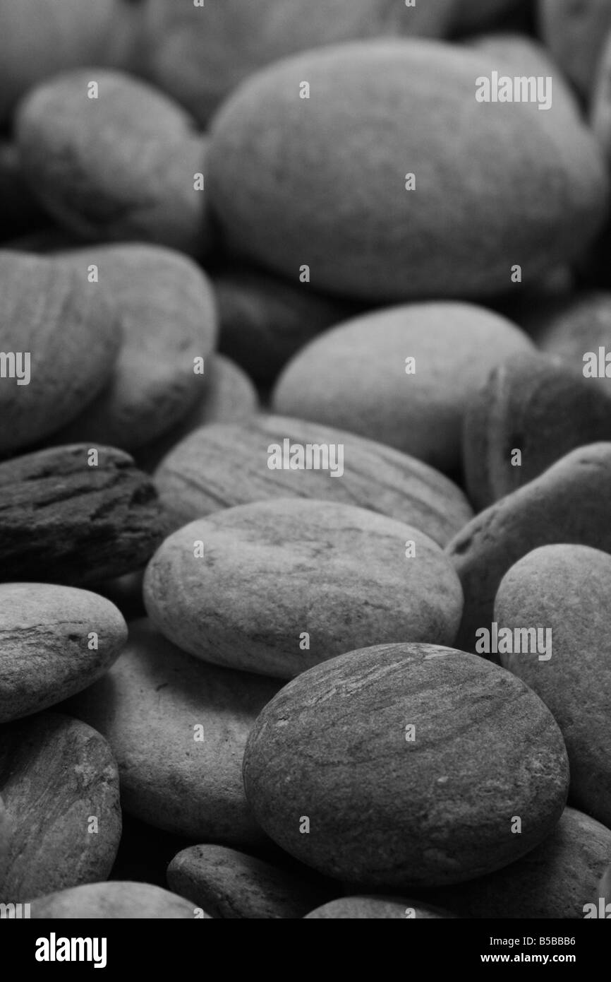 A collection of round pebbles on a beach Stock Photo - Alamy