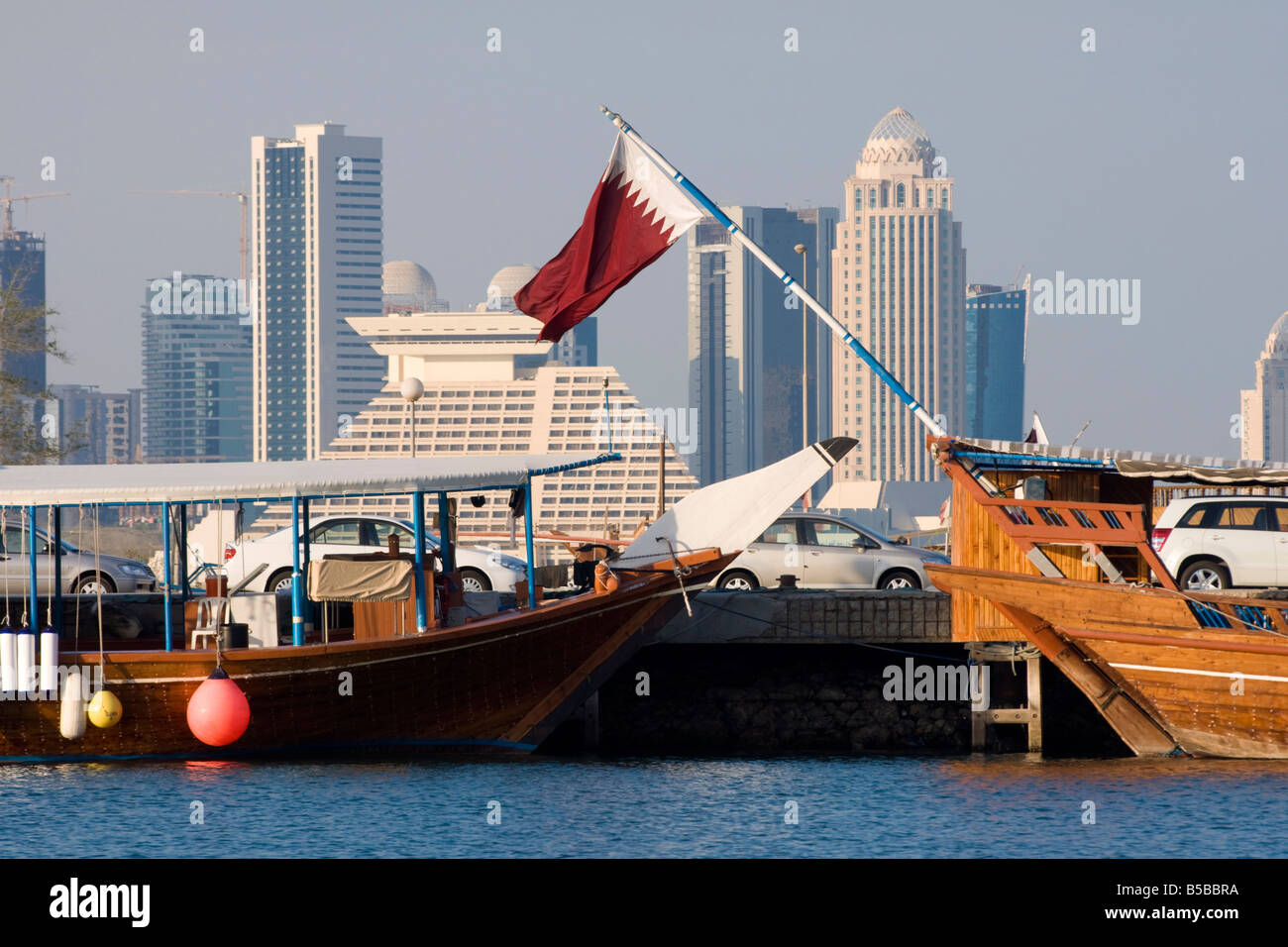 Dhows in Doha Bay and city skyline, Doha, Qatar, Middle East Stock ...