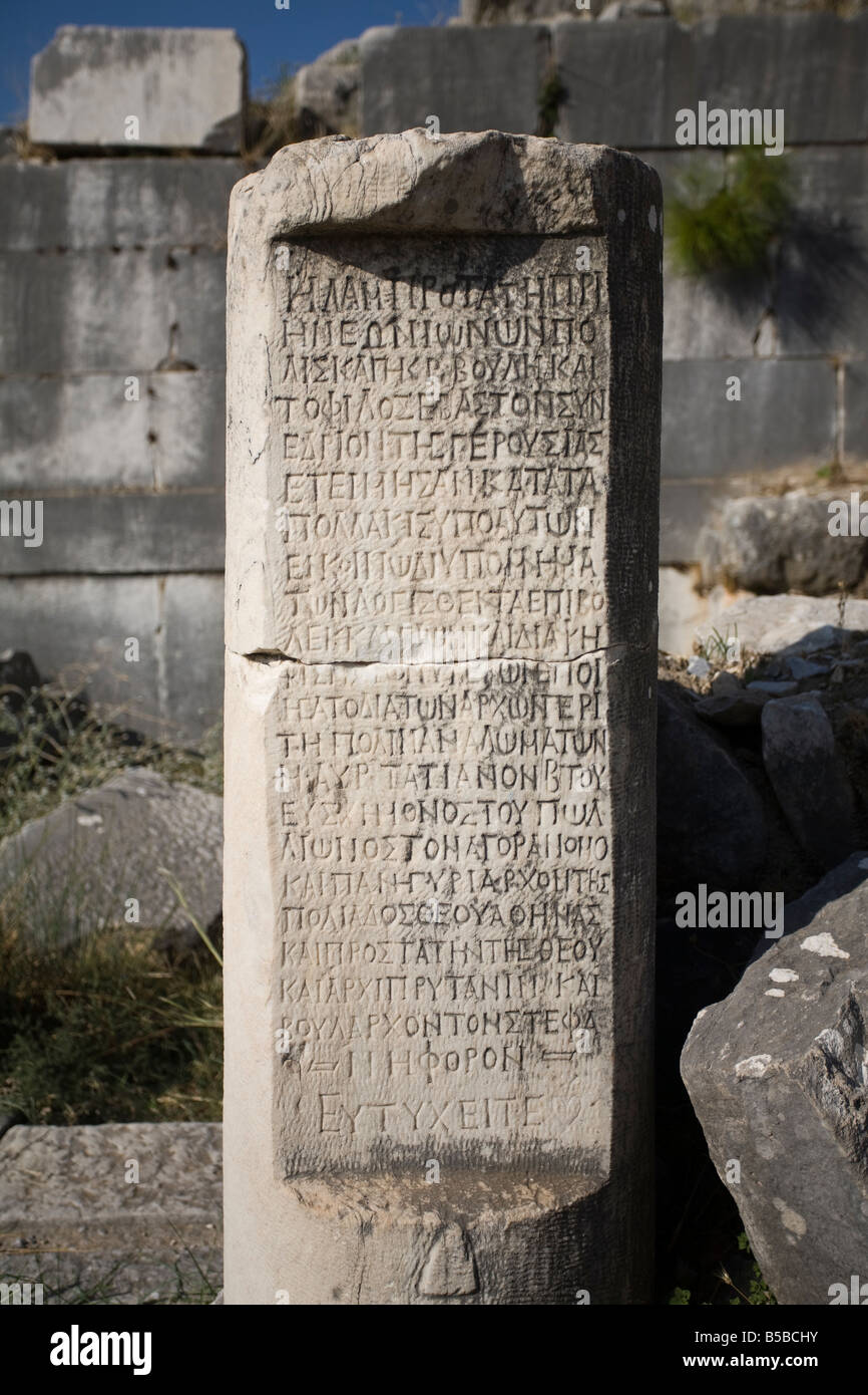 Stone with Greek inscriptions at Priene in Turkey Stock Photo - Alamy