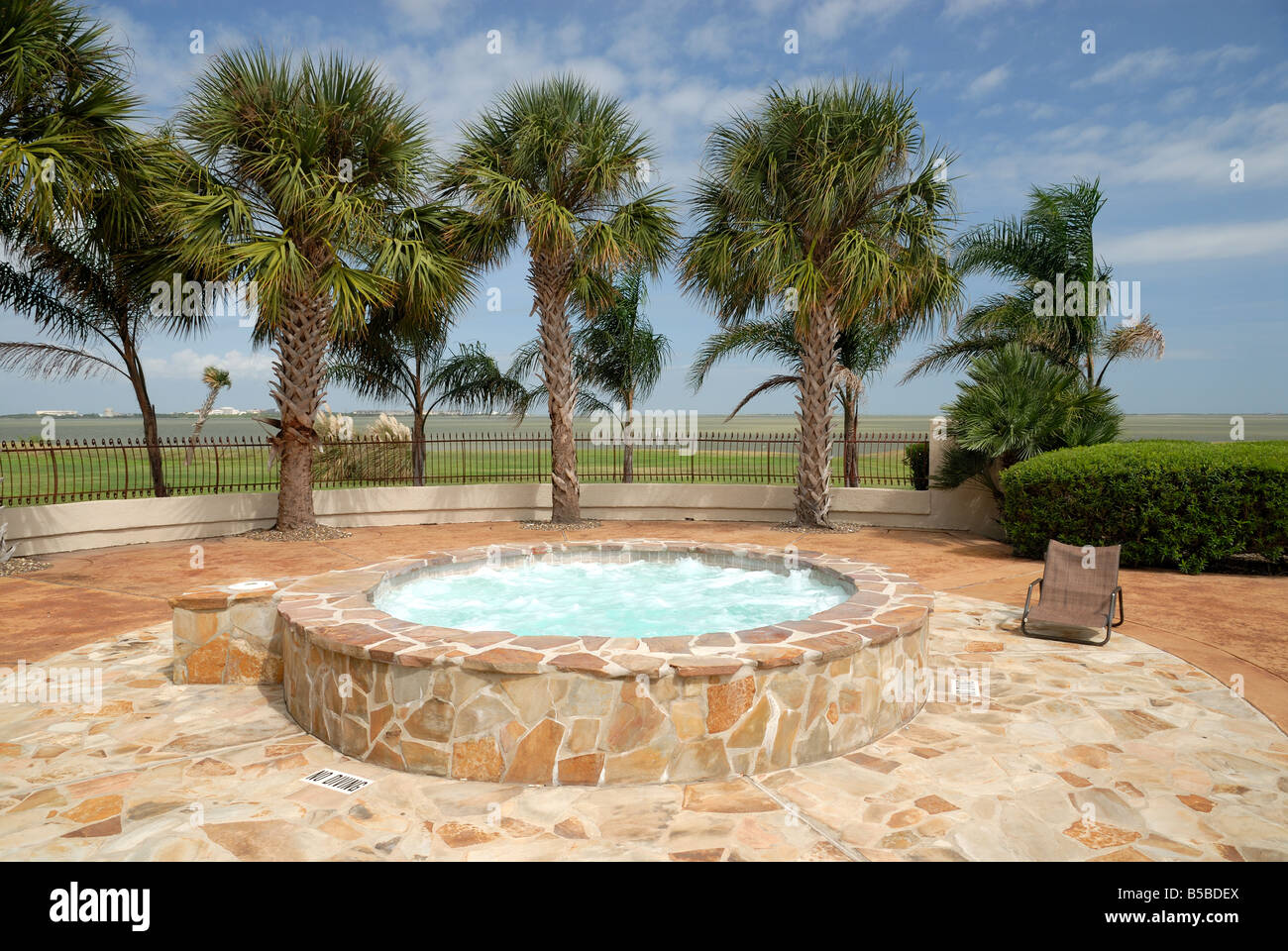 Tropical resort with jacuzzi Stock Photo - Alamy