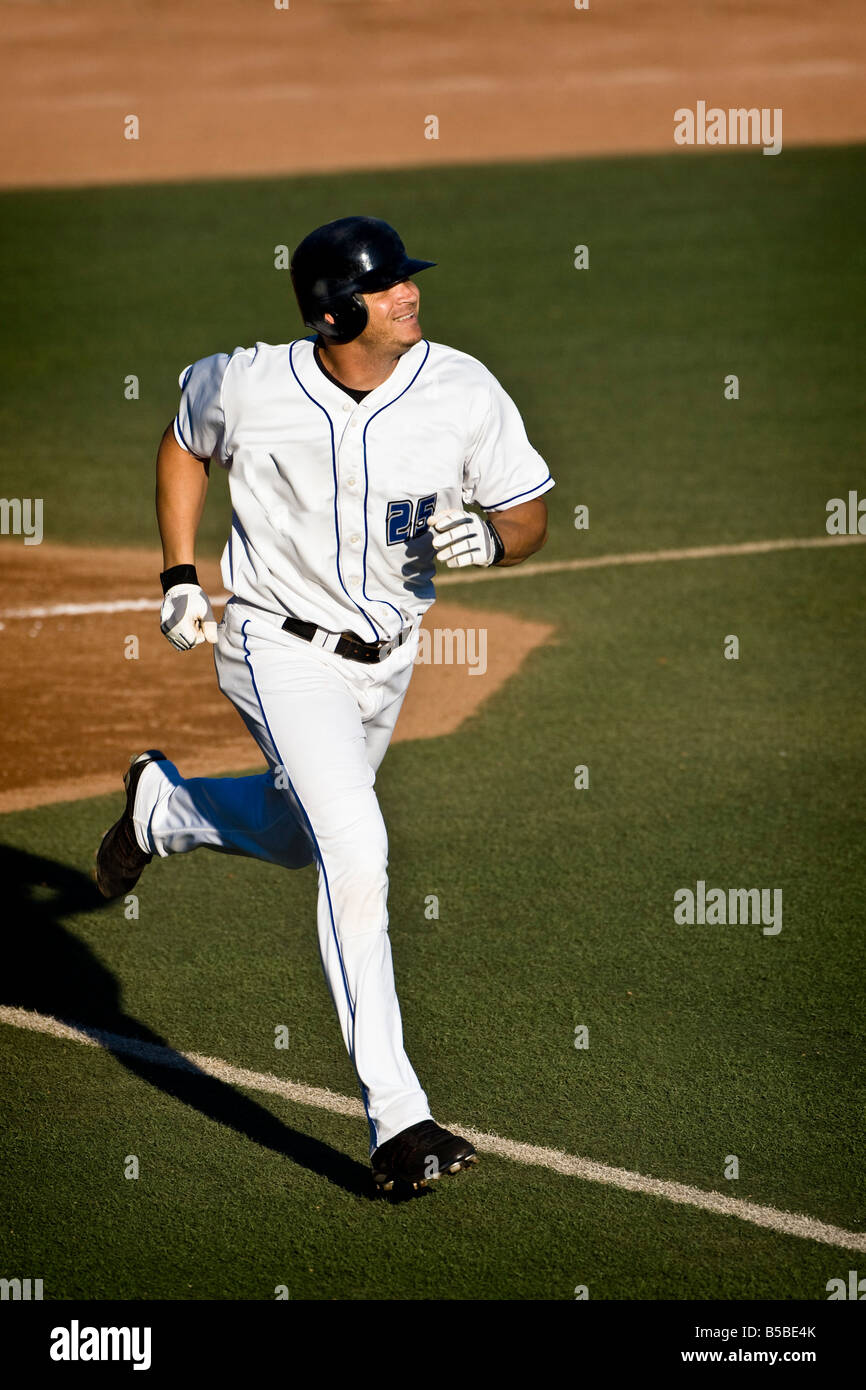 Baseball player running Stock Photo - Alamy
