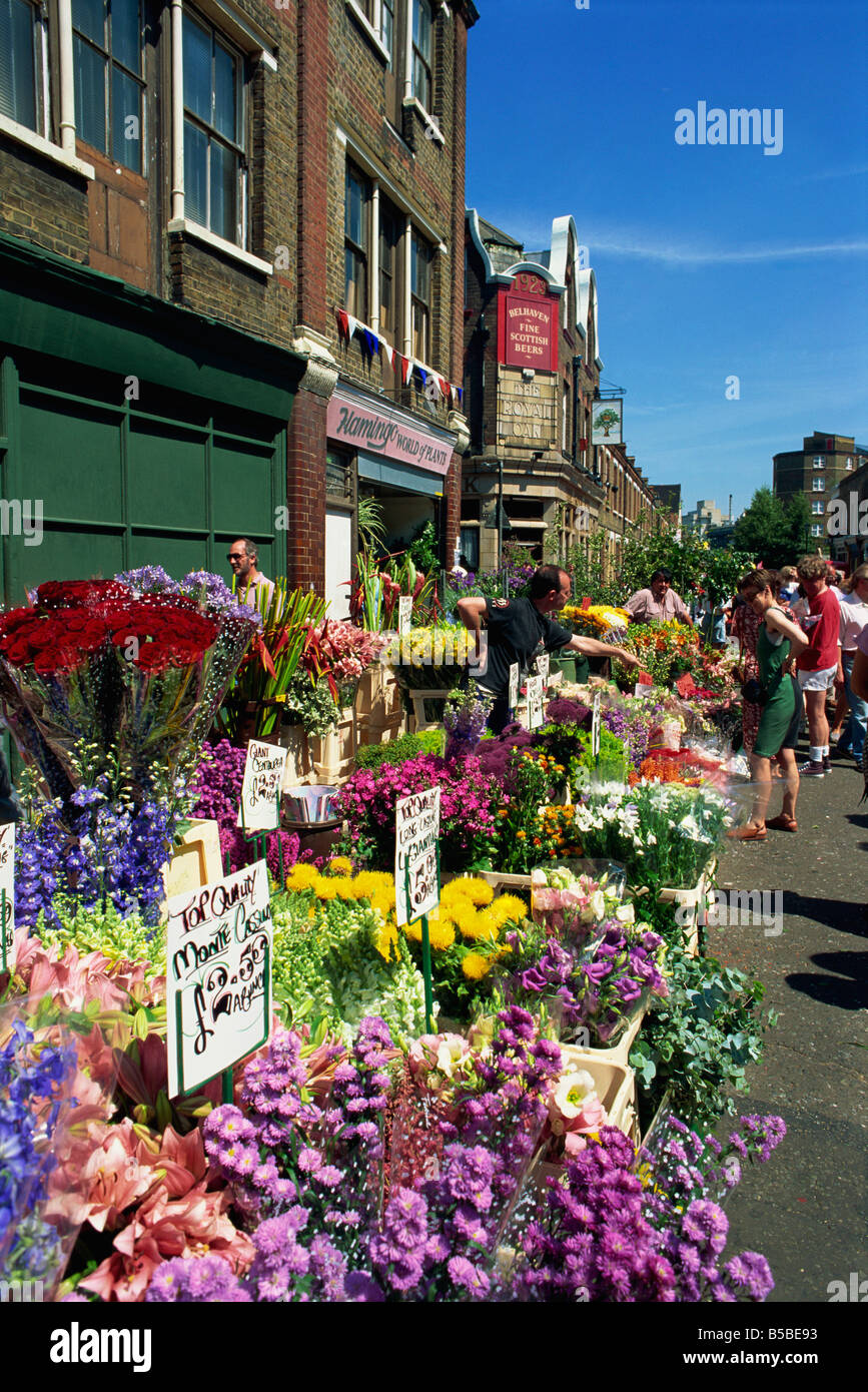 Vibrant displays of cut flowers at East End's Sunday flower market ...