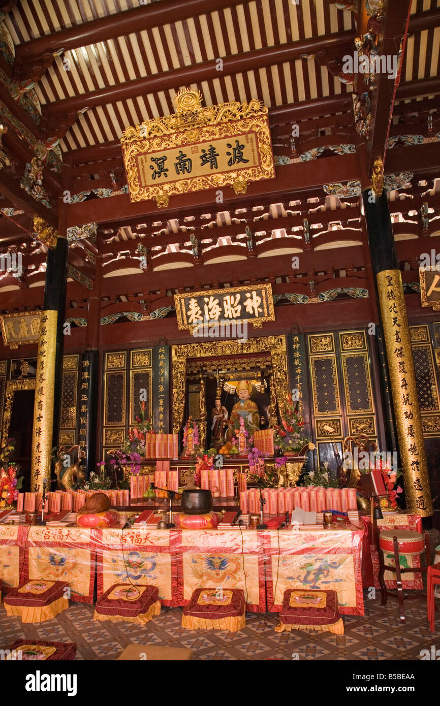 Altar in main prayer hall of Taoist temple, with Ma Po Cho sea goddess ...