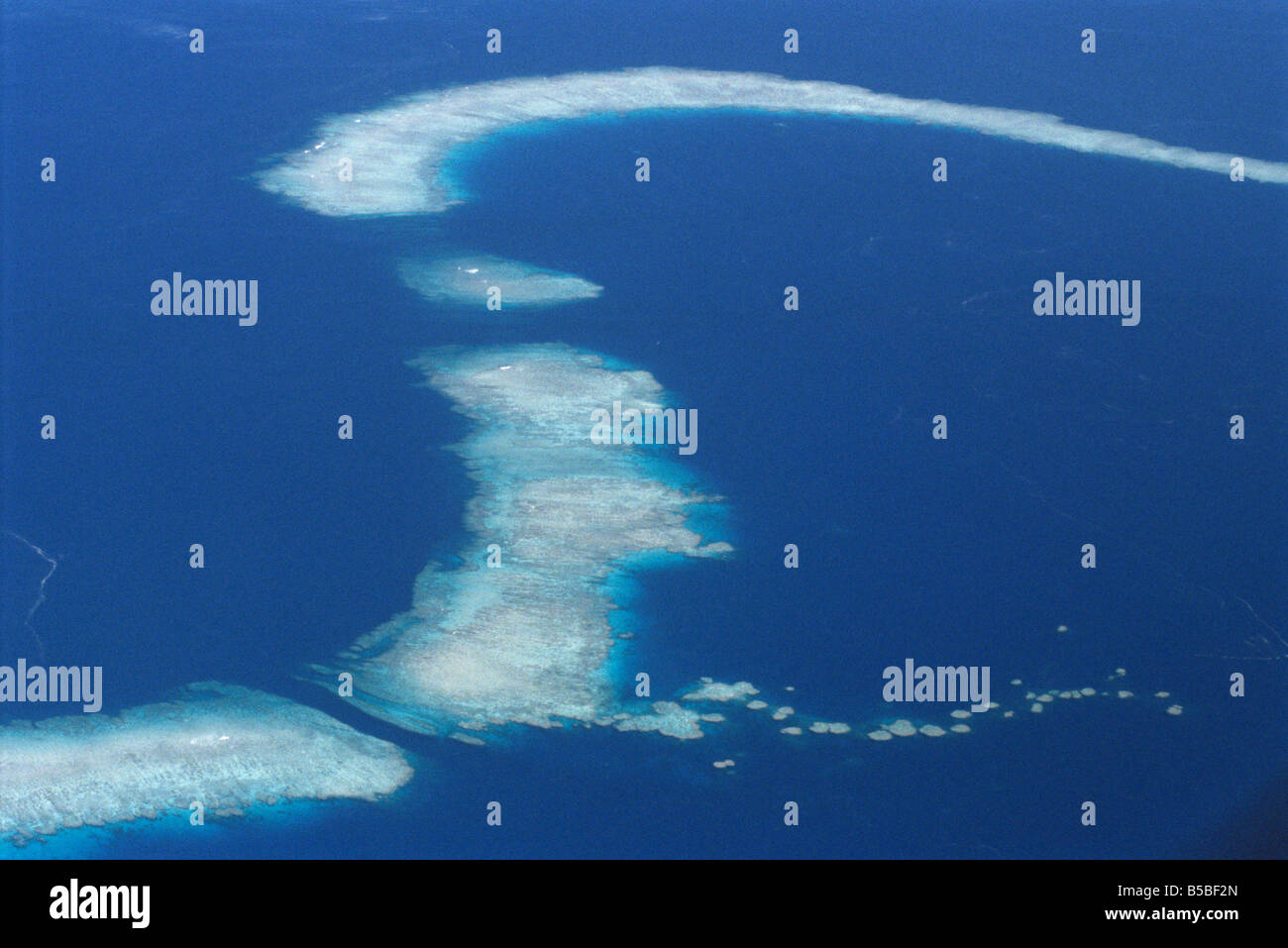 Aerial of offshore reef systems in the Solomon Islands Pacific L Murray ...