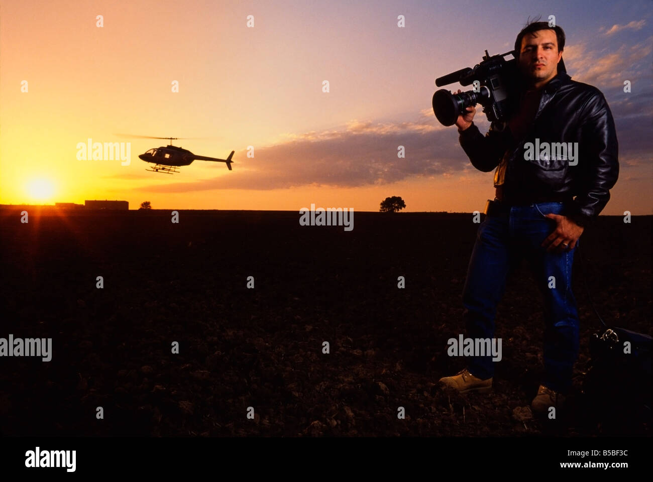 People working,TV cameraman with traffic helicopter Stock Photo - Alamy