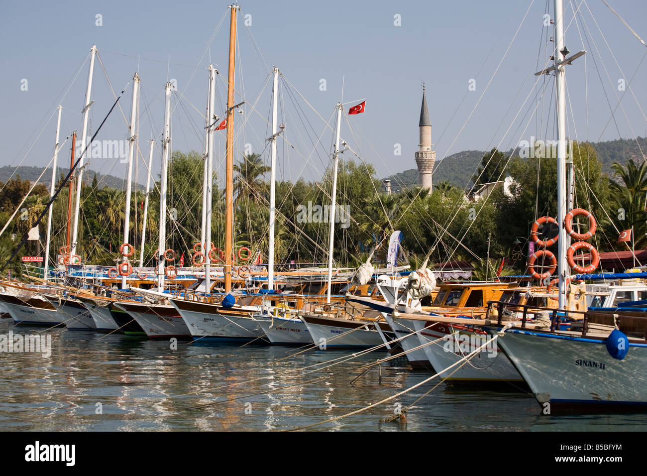 Bodrum harbor with ships and minaret Stock Photo - Alamy