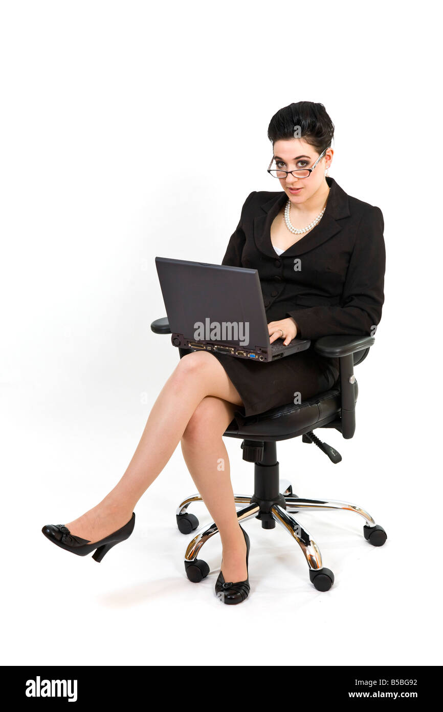 Business woman using a laptop Stock Photo - Alamy